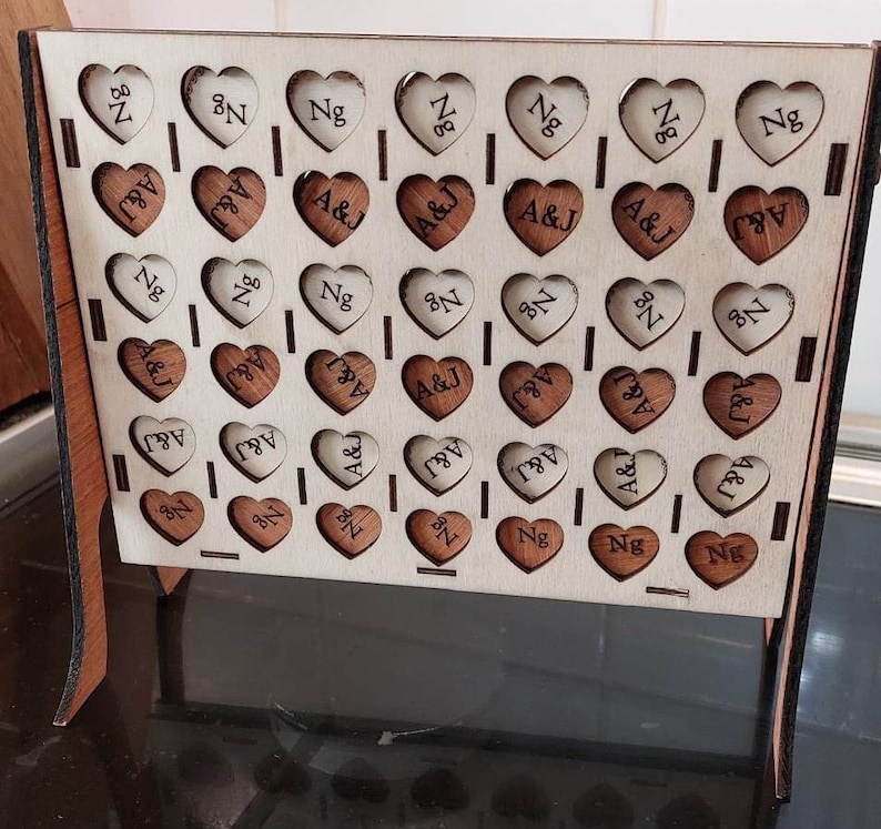 Compact Wooden Connect 4 Table Game brought to you by Wooduplay