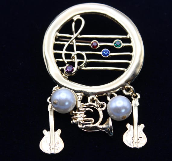 Treble Clef gold tone lapel pin - Gem