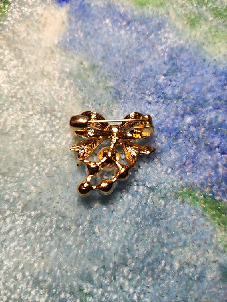 Broche arc en or détaillée paillettes belle couleur or arc perles ...