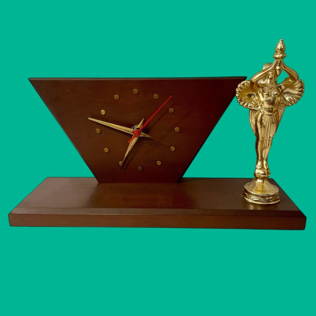MCM Atomic Design Wood Mantle Clock With Brass Winged Goddess Figure ...