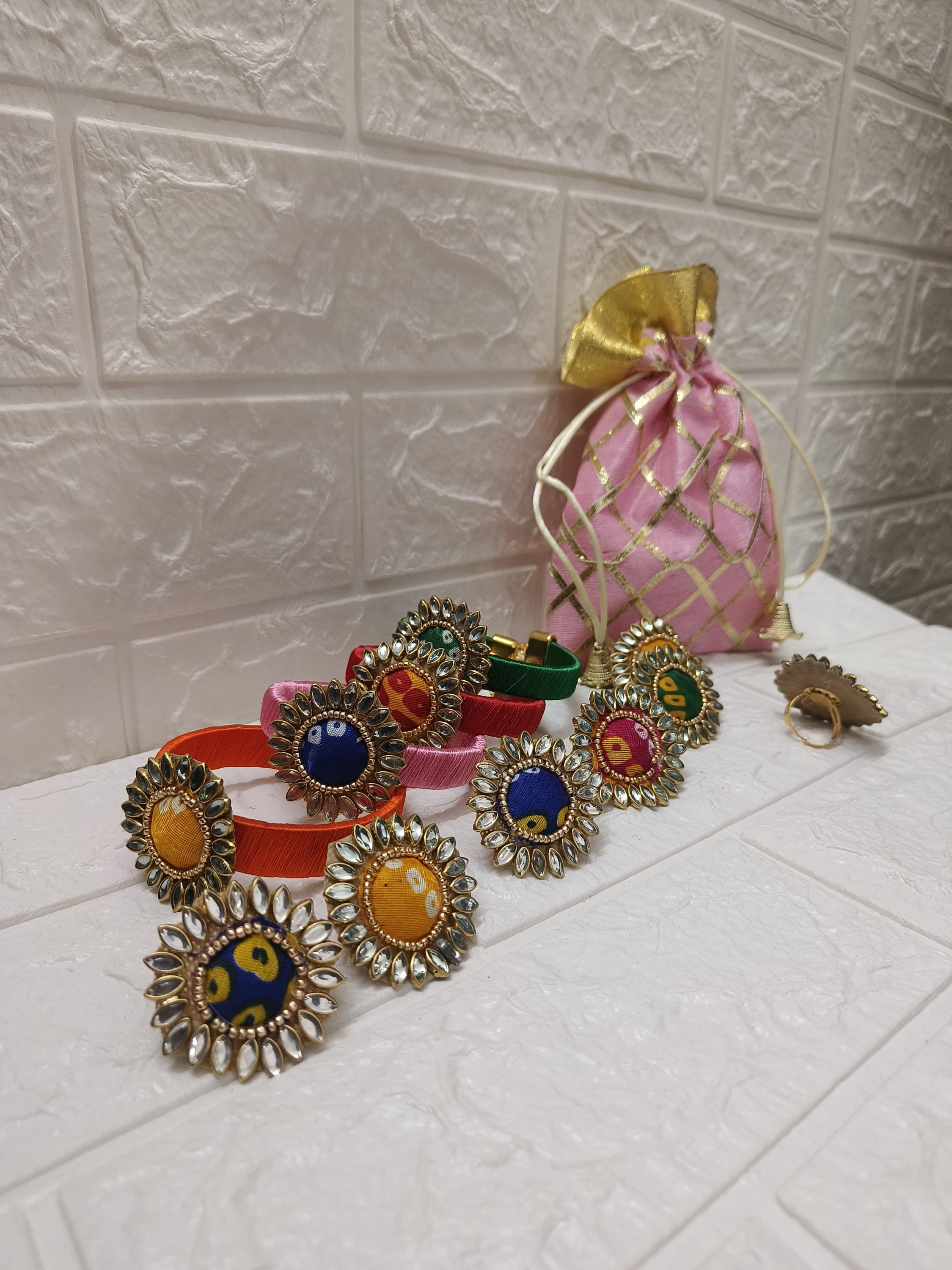 Elegant Wedding Return Gifts Combo: Fabric Potli Bag, Bracelet, & Ring ...