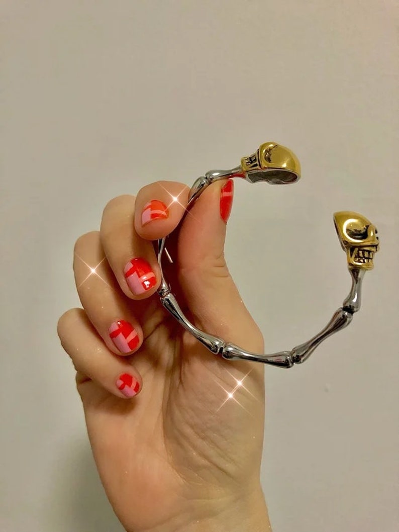Adjustable Double Head Skull Bangle Unisex Bracelet With Bones Feature ...