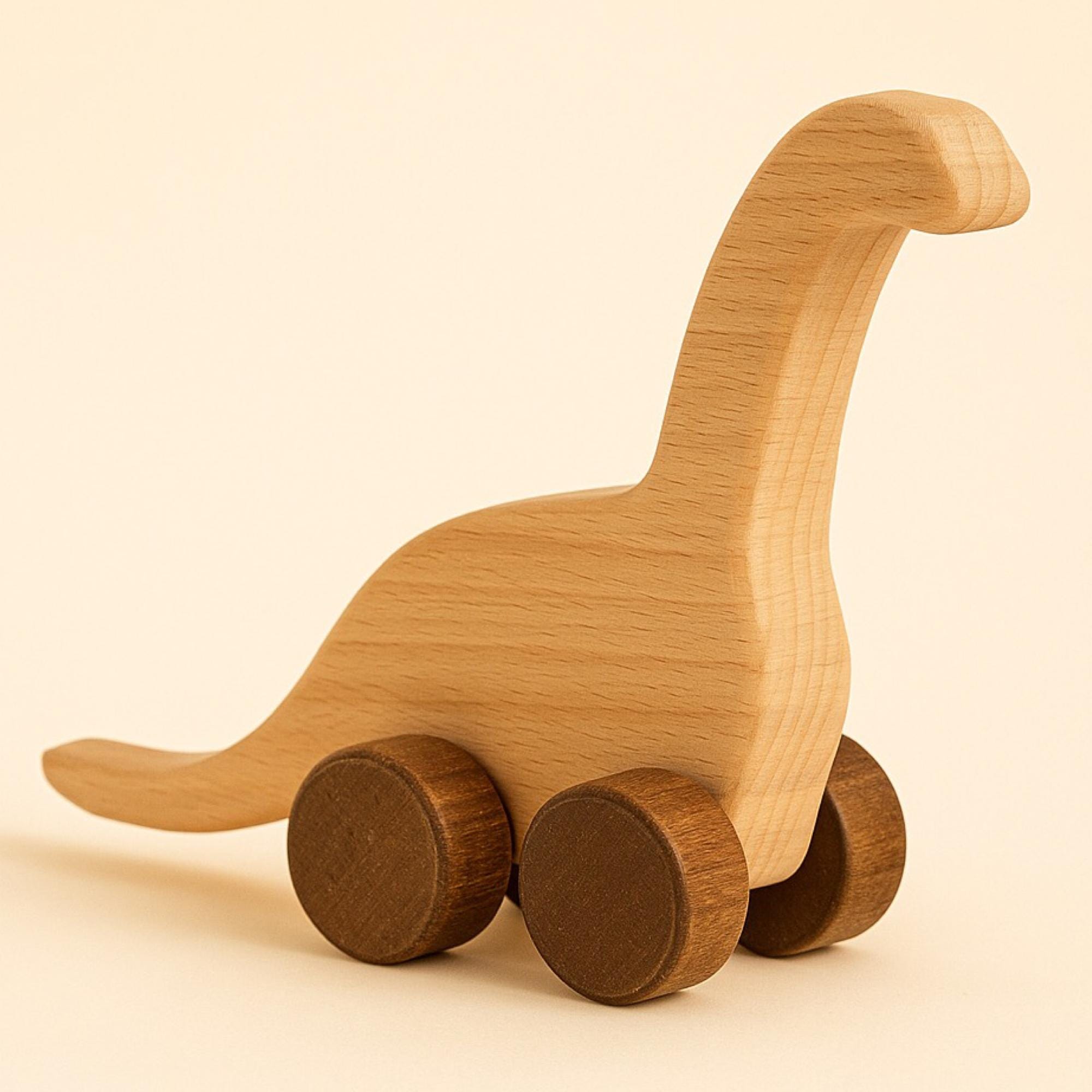 Handmade Wooden Dinosaur Toy on Wheels – Montessori Push Toy for ...