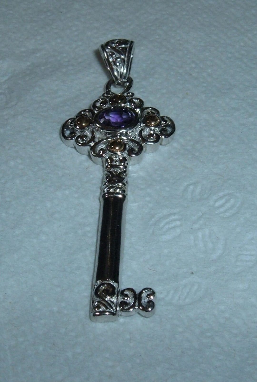 Sterling Silver Key Pendant Features a Oval-shaped Amethyst Stone and ...