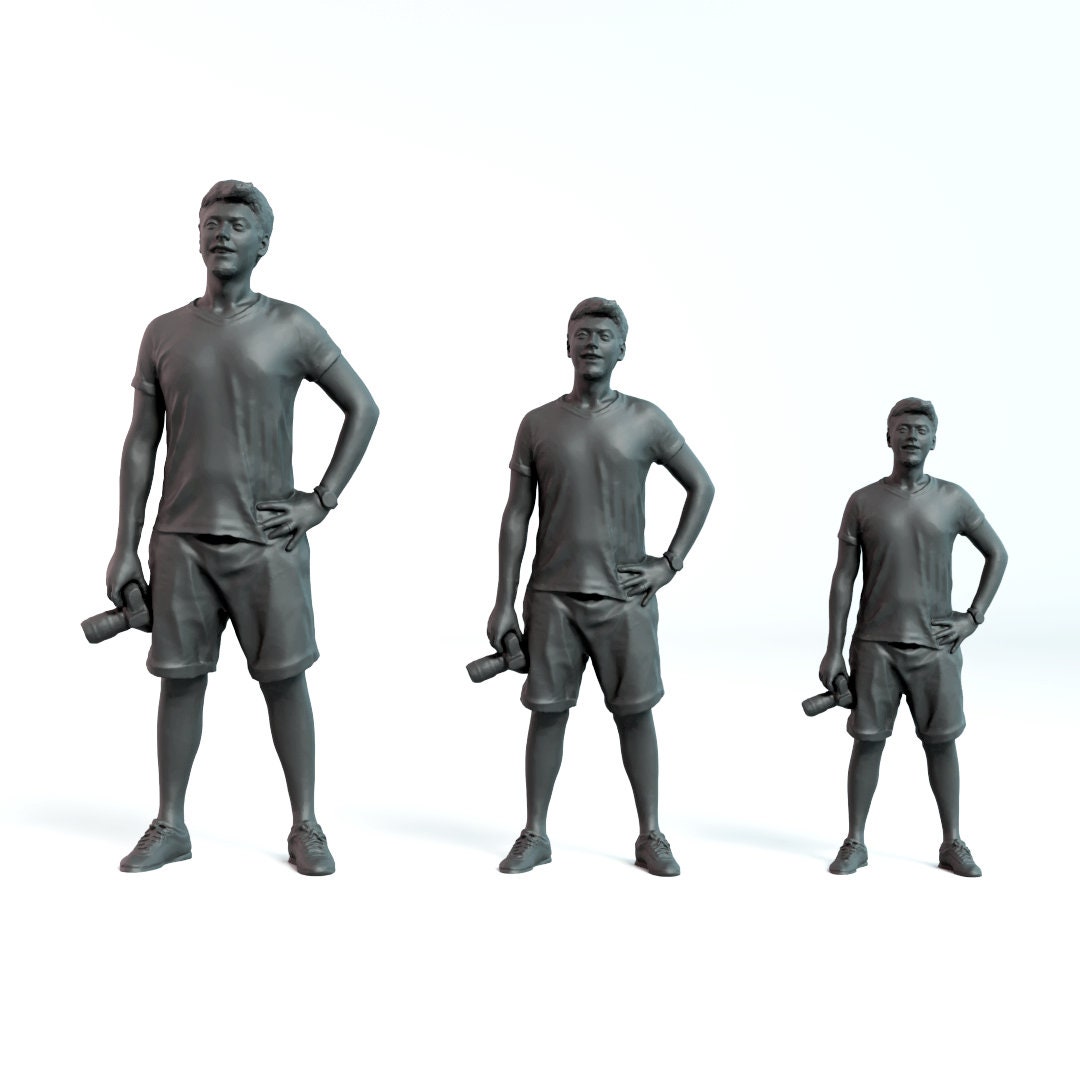 Miniature Young Man in Sporty Attire With Camera, Railway Model ...