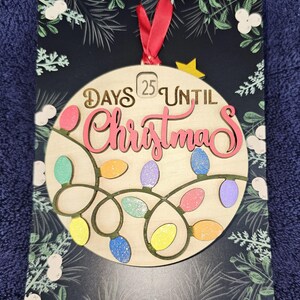 Christmas Countdown Ornament. Christmas Lights. Rotate the Center Wheel ...