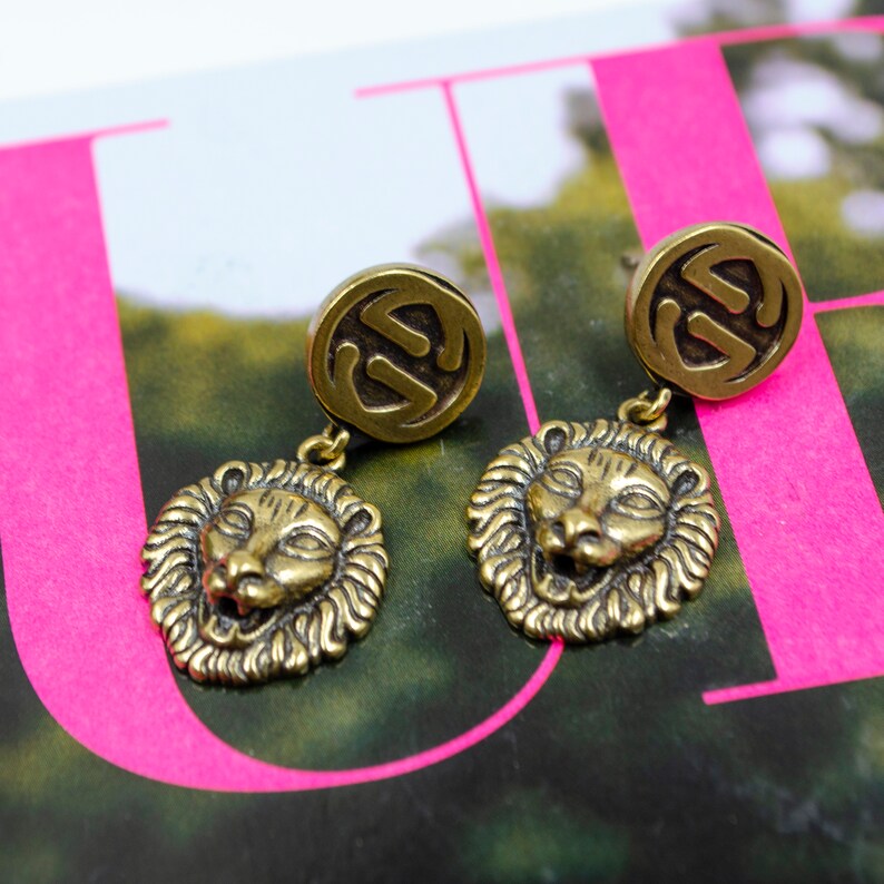 Gucci Interlock Bronze Lion Studs Earrings - Etsy
