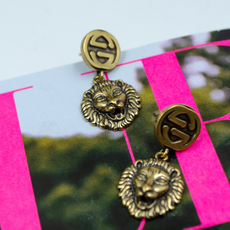 Gucci Interlock Bronze Lion Studs Earrings - Etsy