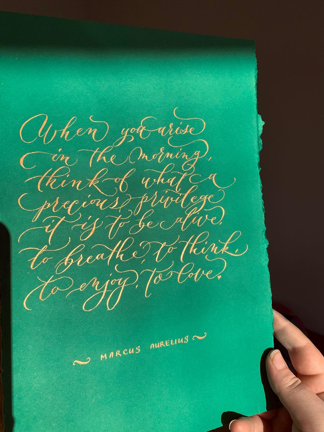 Handwritten Gold Calligraphy Quote on Emerald Green Paper – Stoic Wall ...