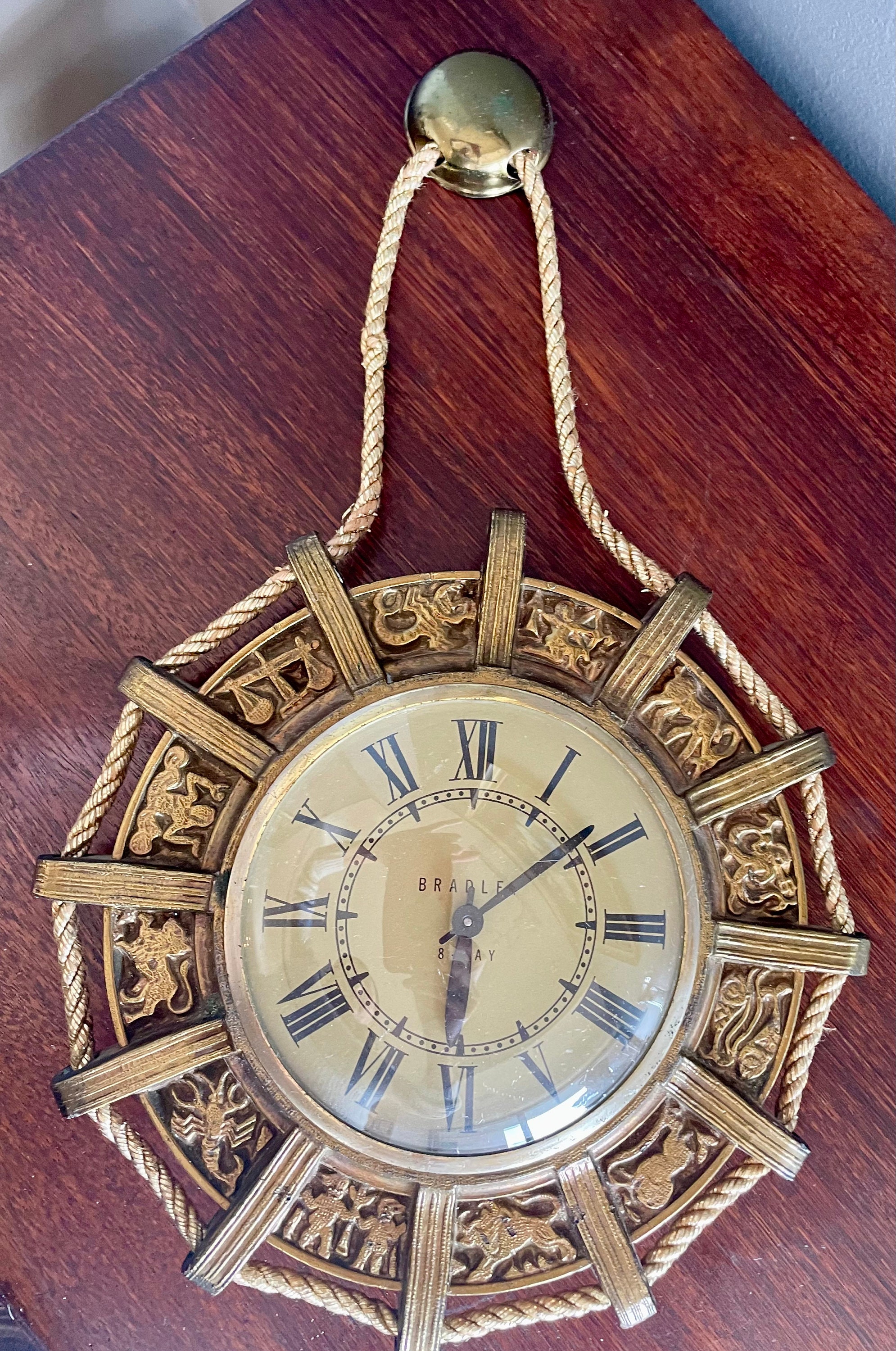 German Brass Zodiac Signs Wind up Wall Clock With Rope Hanger - Etsy