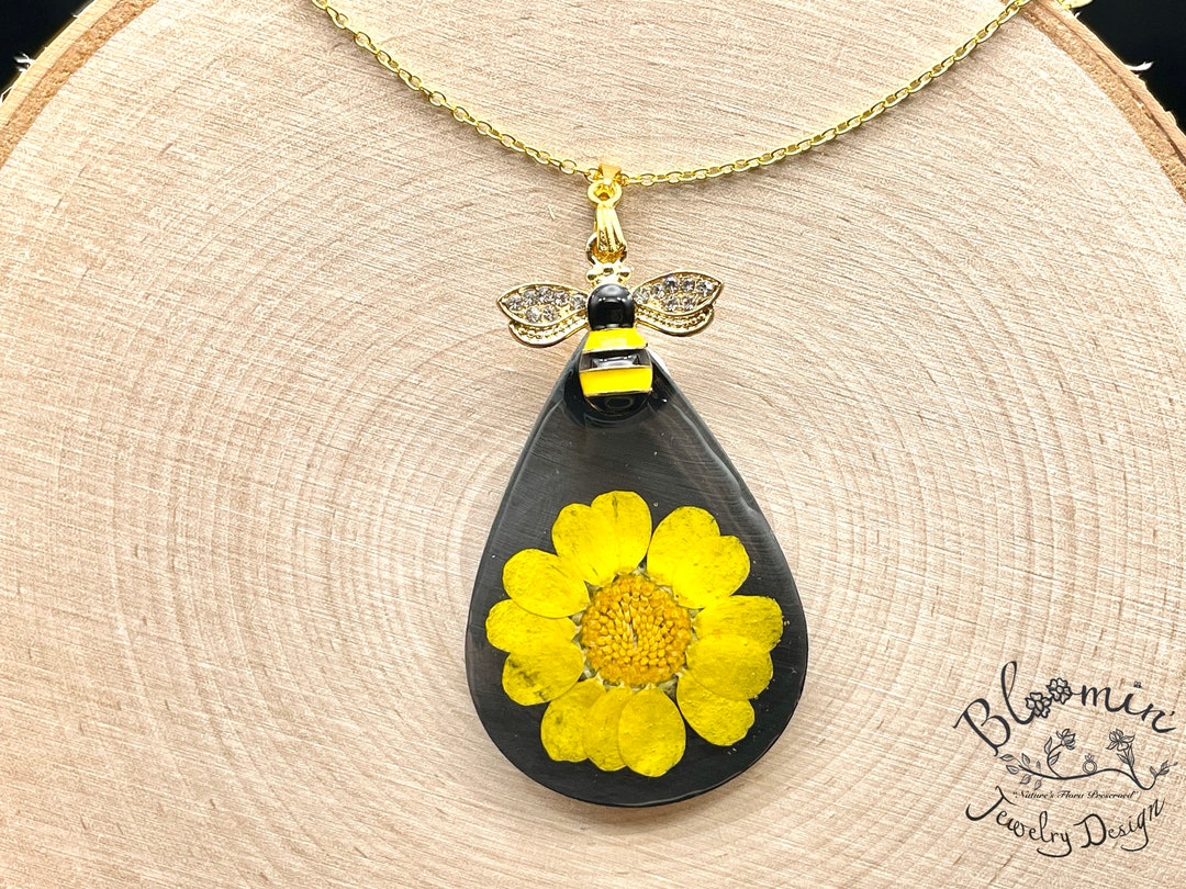Real Mini Sunflower on Black Semi-transparent Teardrop Pendant Necklace ...