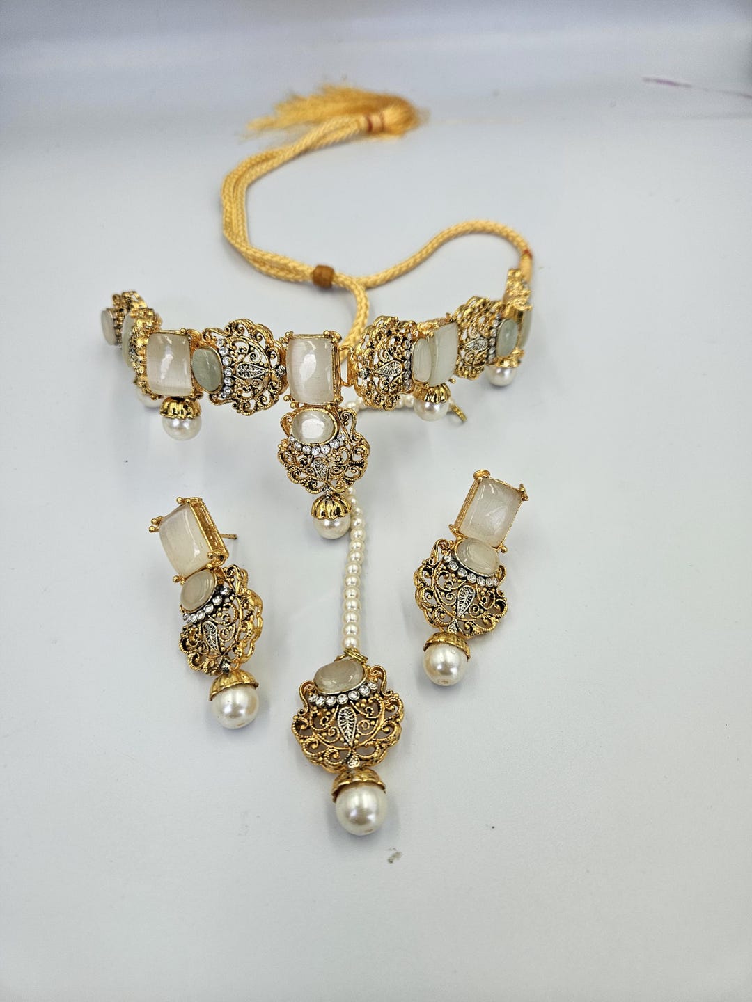 Gold Polish Pearl White Chokar Set With Earings and Mang Tikka Tikli ...