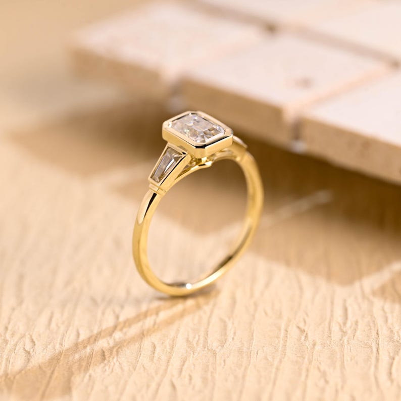Solid Gold Bezel Emerald Cut Moissanite Engagement Ring, Three Stone ...