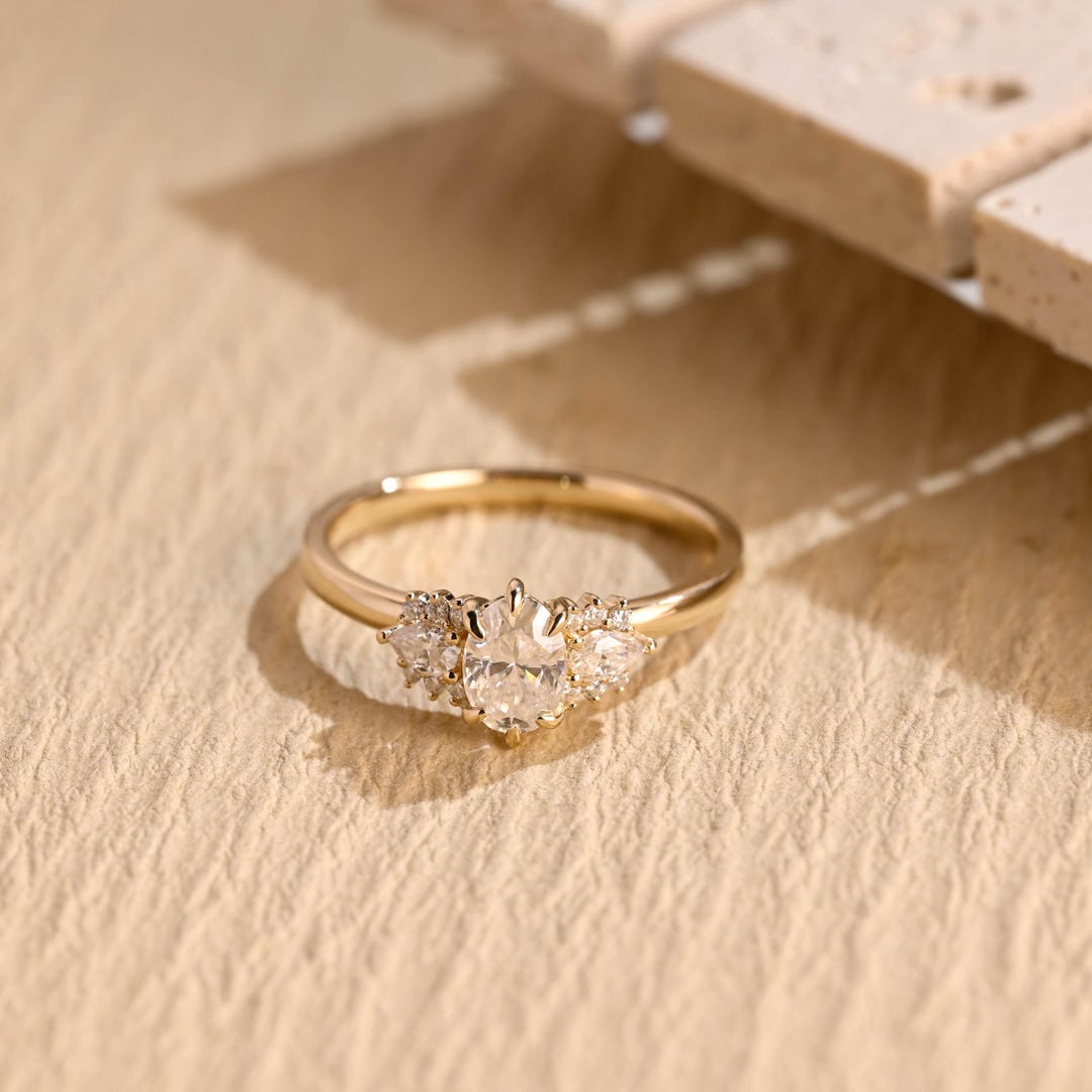 Solid Gold Side Cluster Oval Moissanite Engagement Ring • Three Stone ...