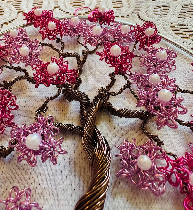 Wire Tree With Pink Flowers With Pearl Colored Beads. Brown Trunk. Sun ...