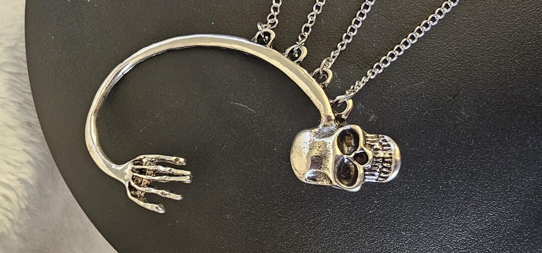 Silver Skull and Bone Hand Ear Cuff With Dangling Smaller Skulls. - Etsy