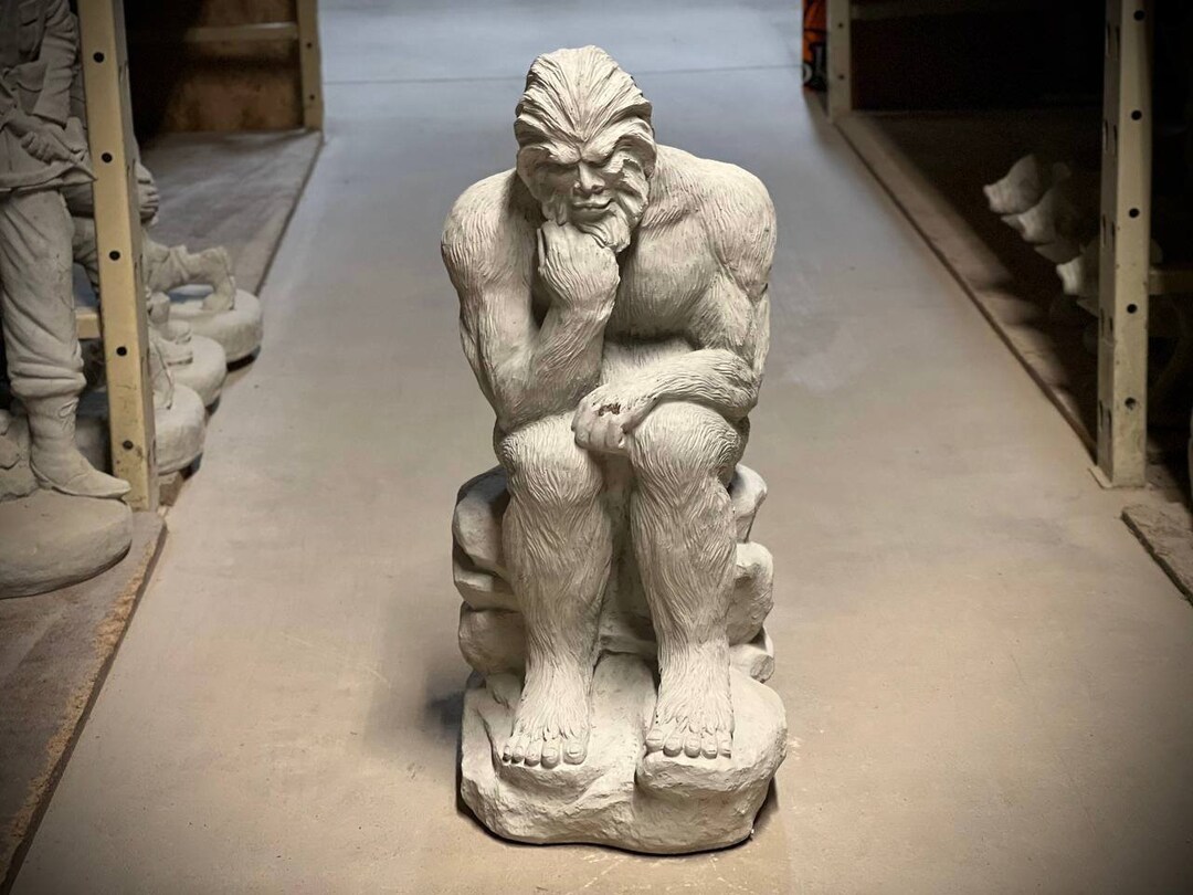 Large Bigfoot Sitting on Stone Statue Huge Snowman on Rock Figure ...