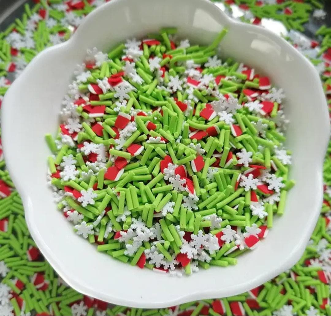 Green Sprinkles White Snow Flakes and Red Santa Clause Hat A Classic ...