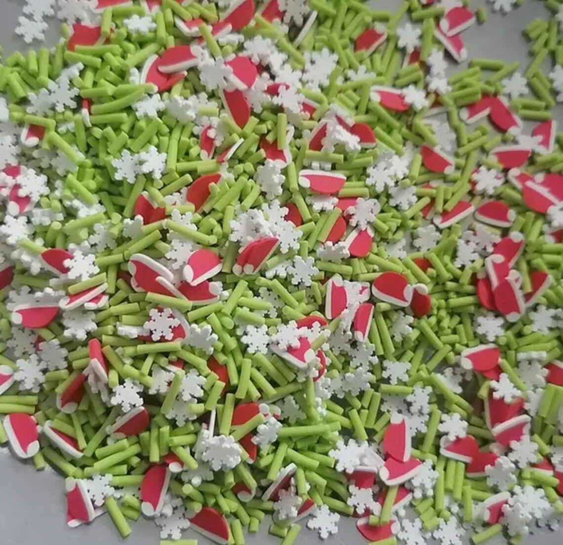 Green Sprinkles White Snow Flakes and Red Santa Clause Hat A Classic ...