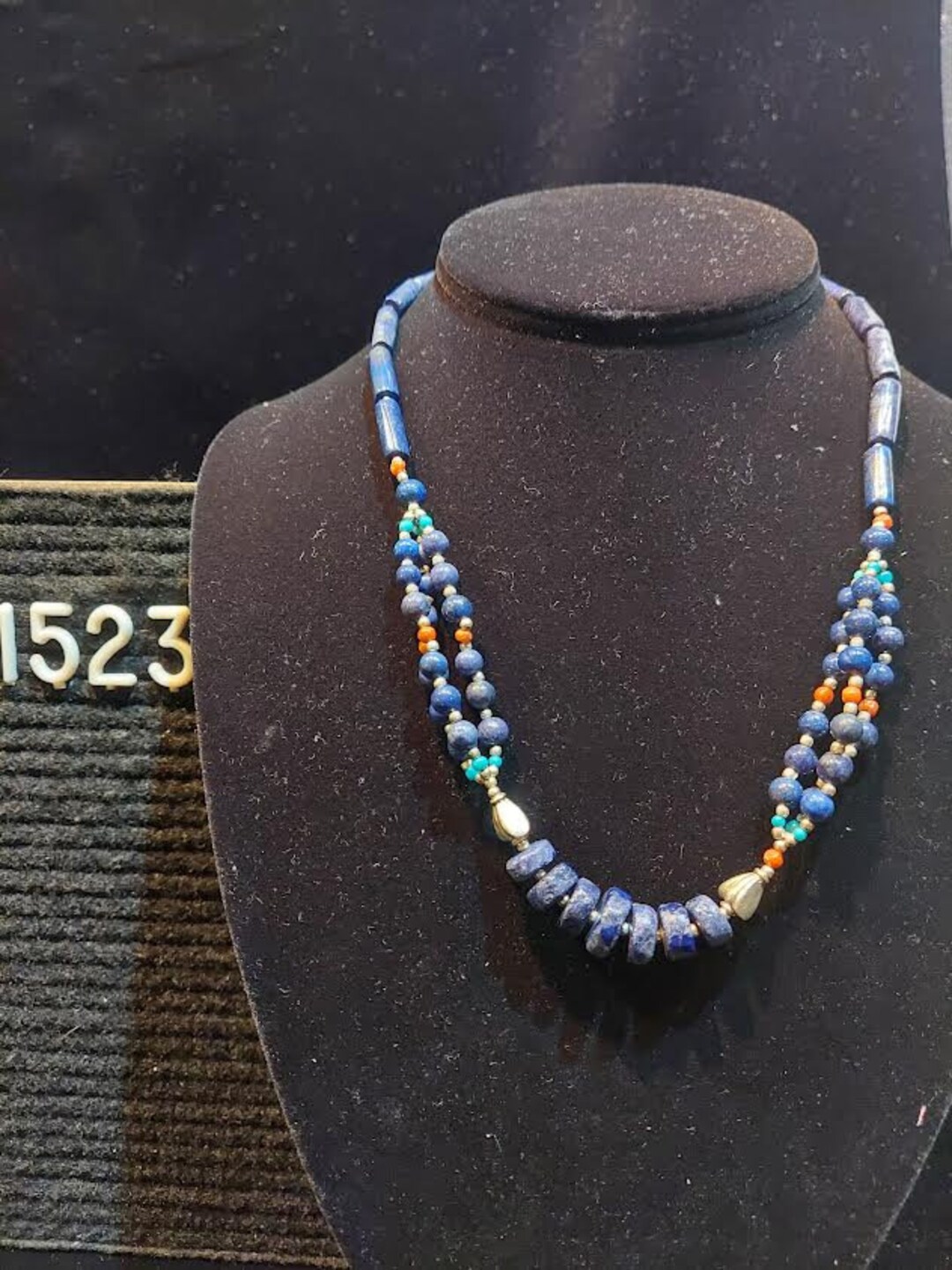 Blue Stones of Various Shapes and Sizes With Accents in Orange and ...