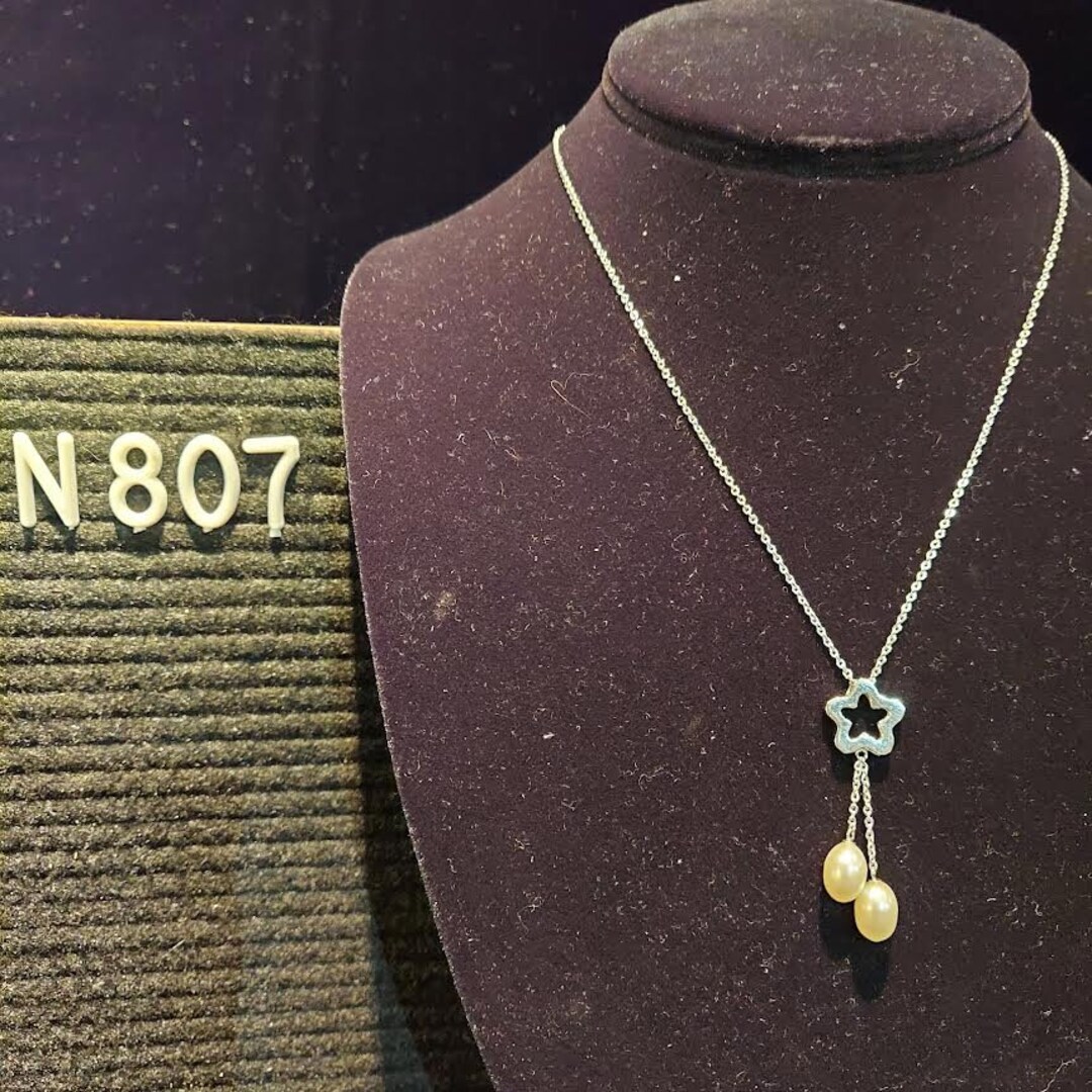 Silver Tone Start Pendant Necklace Has 2 Egg Shaped Beads That Look ...