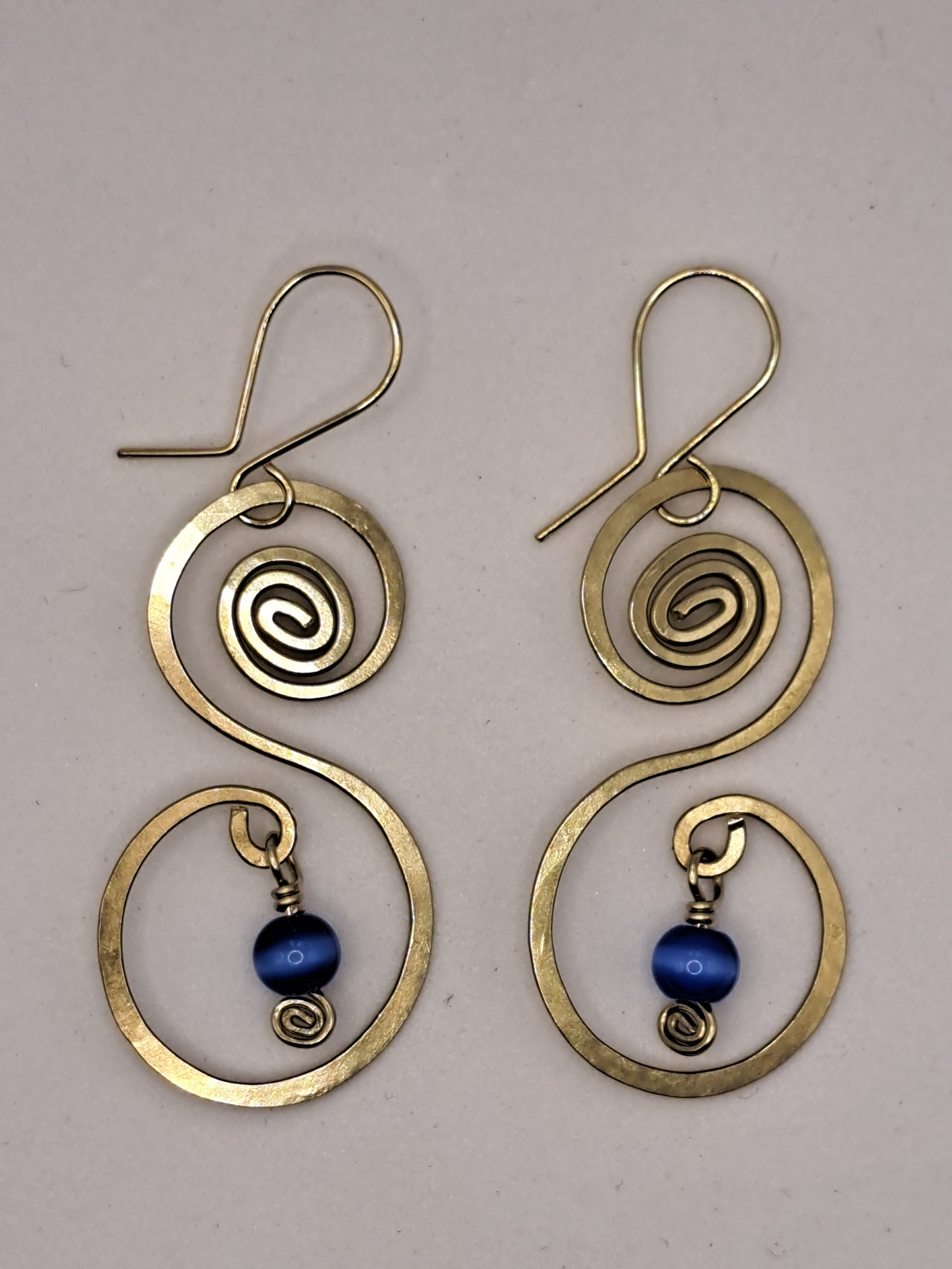 Continuous Movement Earrings - Etsy