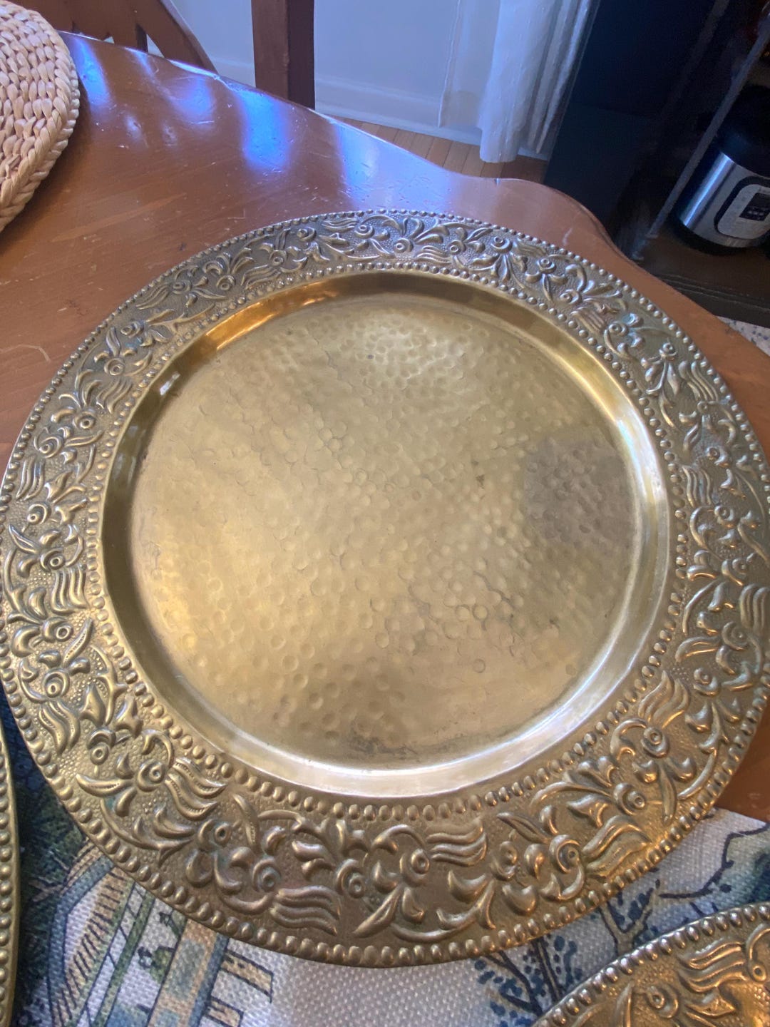 Four Vintage Hammered Brass Chargers With Ornate Scroll Details Along ...