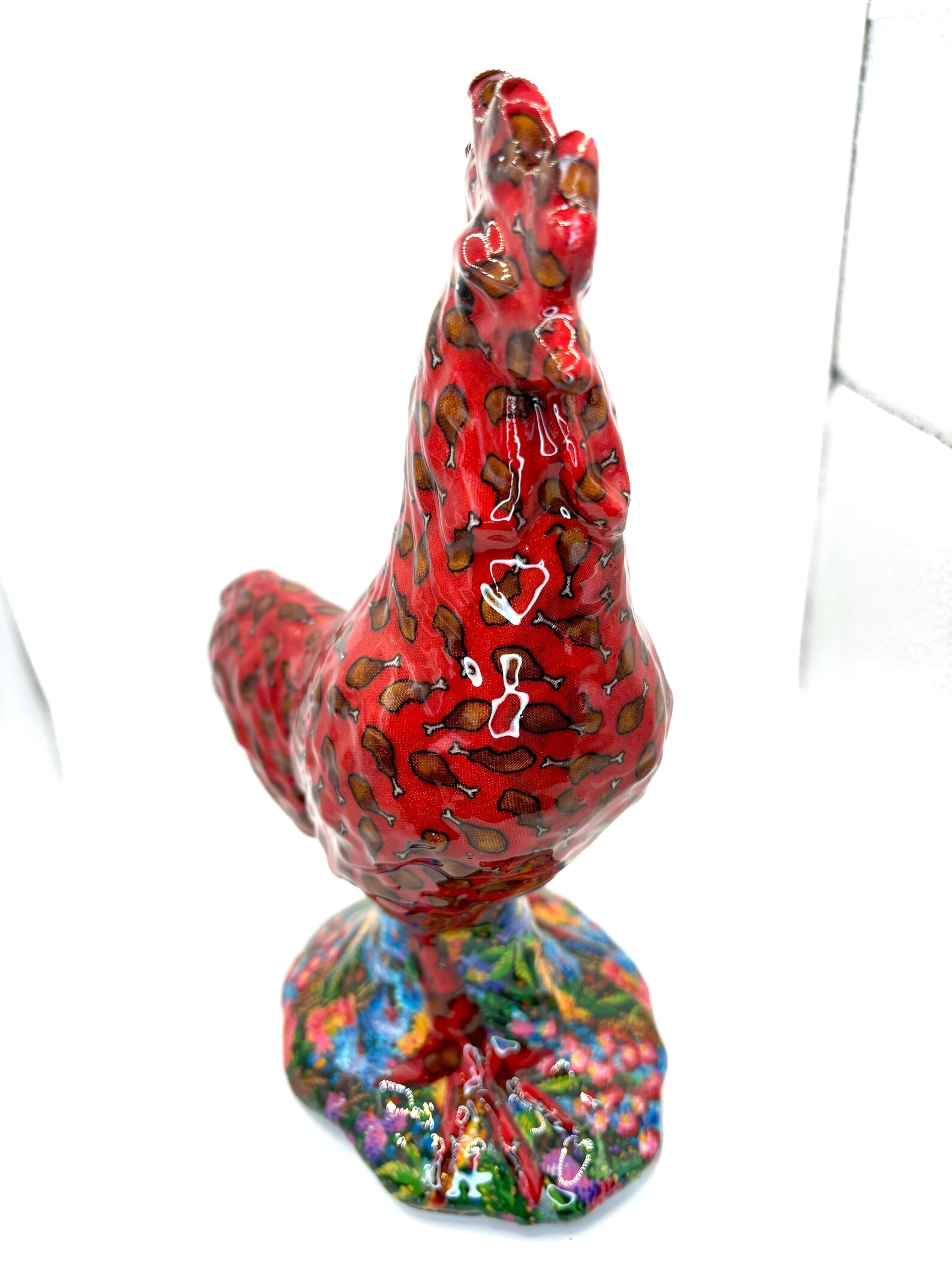 Red Rooster Covered With Chicken Drumsticks in a Field of Wildflowers ...