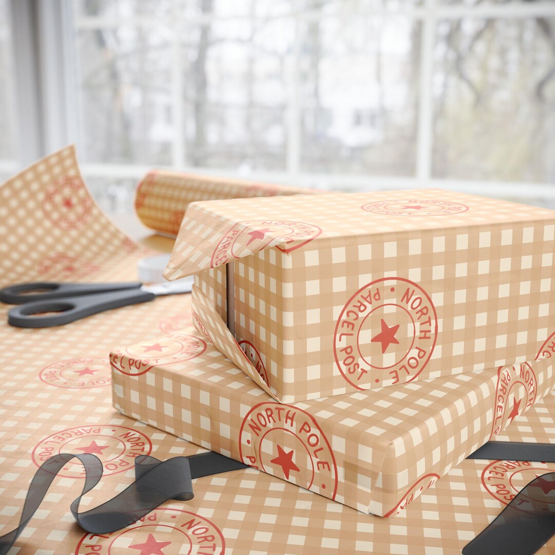 North Pole Parcel Seal Wrapping Papers | Gingham Holiday Wrapping Paper ...