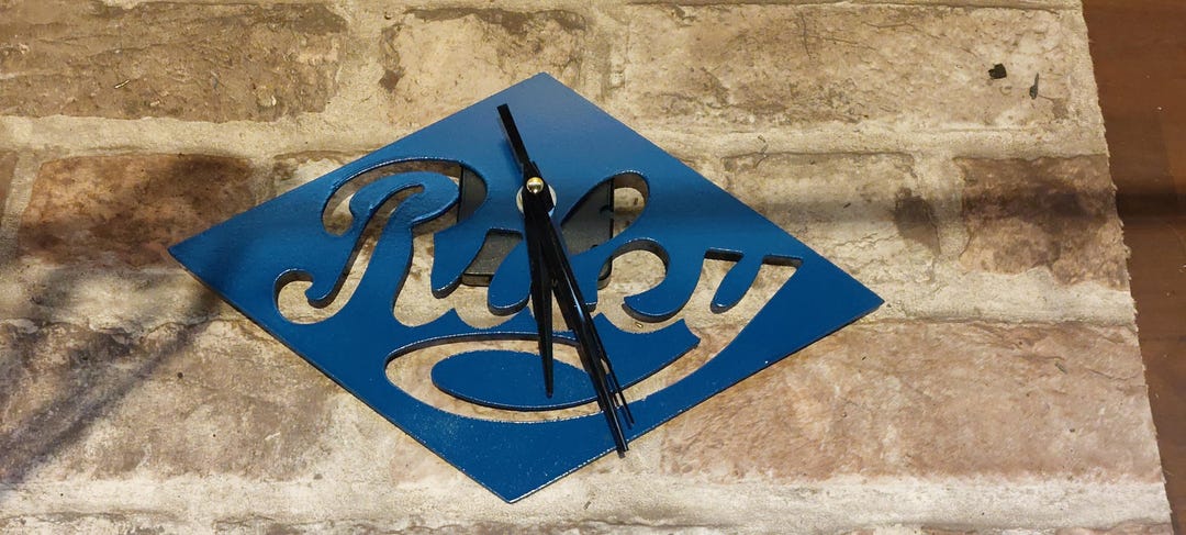 Riley Logo Wall Clock - Etsy