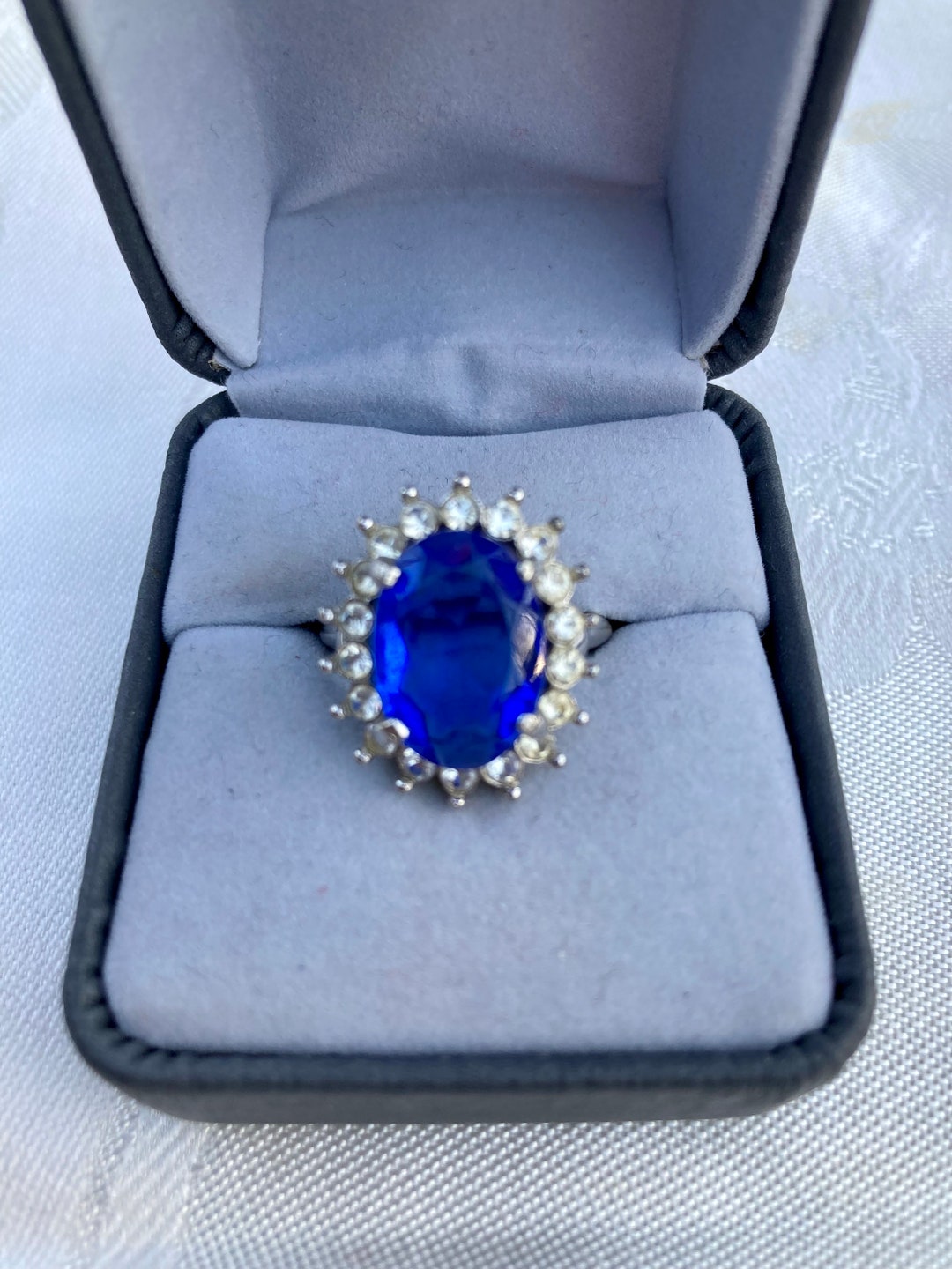 1970s Vintage Avon Ring With a Large Oval Blue Faceted Faux Gem ...