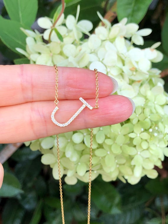 J sideways necklace store