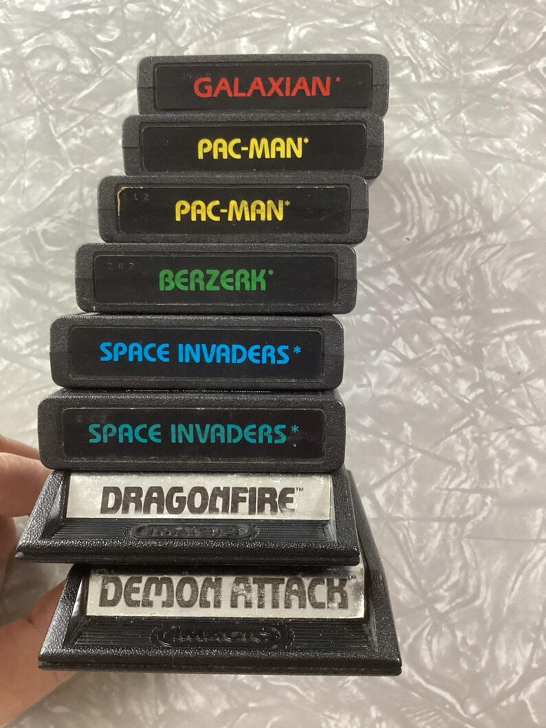 Lot of 8 Atari Video Game Cartridges Pac Man Space Invaders Dragonfire ...