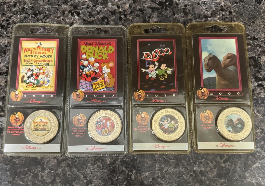 Walt Disney Collectible Decades Coins Set of Four – Vintage Disney ...