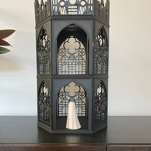 York Ghost Merchant Figurine Stand Tower - Etsy UK