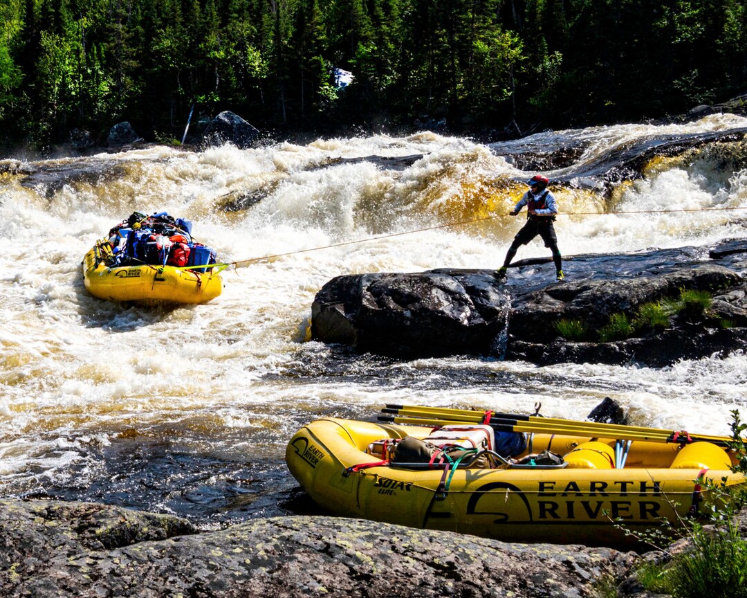 Portaging the Equipment Raft Around the Magpie River Rapids in Upper ...