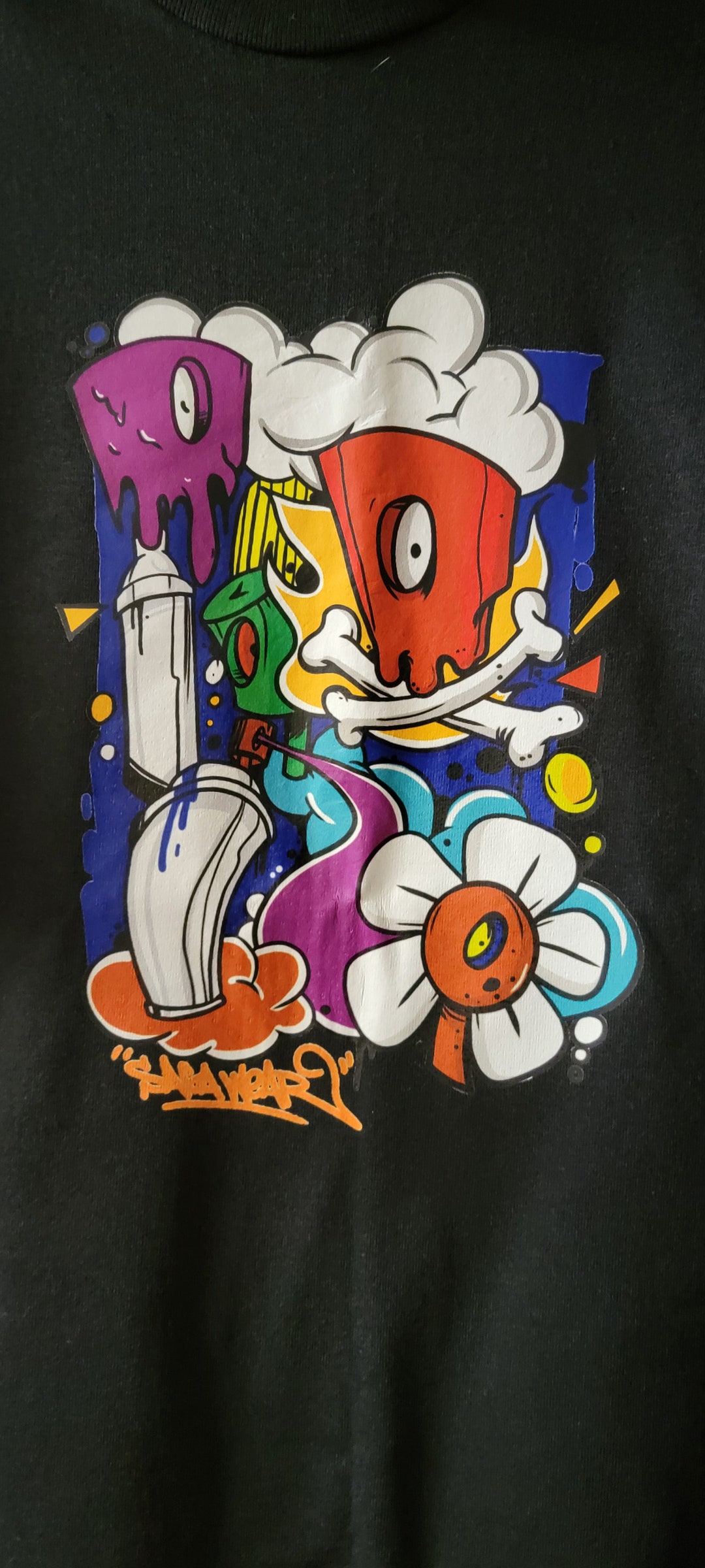 Saga Wear Cyclops Skull and Crossbones Spray Paint Flower Tee - Etsy