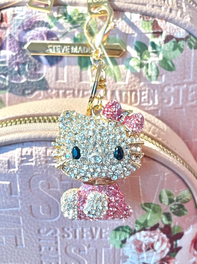 3-D Adorable Sanrio This **hello Kitty Rhinestone Keychain** Features ...