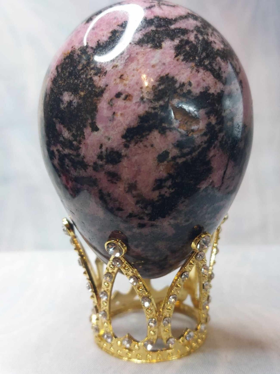 Crystal Rhodonite Egg With Crown Sphere Holder - Etsy