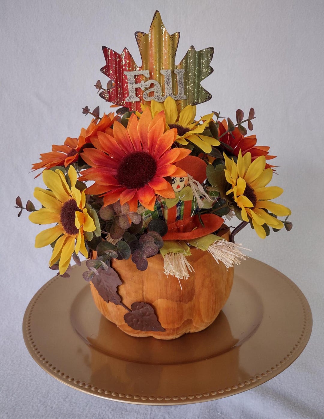 Fall Arrangement With Tri-colored Sign, Scarecrow, and Orange and ...