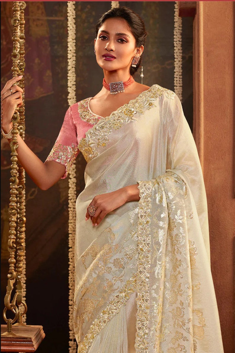 Traditional Ivory Viscose Silk Designer Saree With Handwoven Exquisite ...