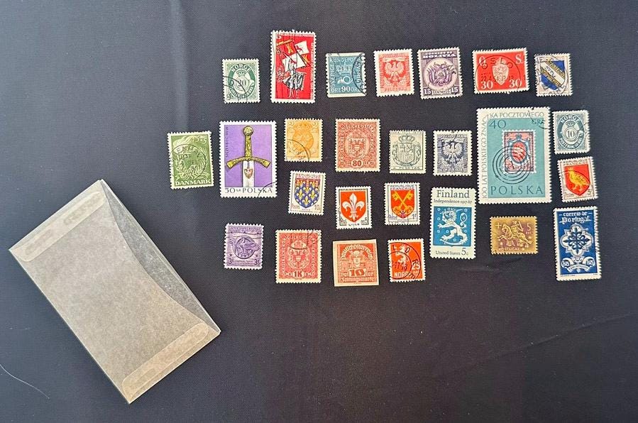 25 Vintage Canceled International Postage Stamps Featuring Crests and ...