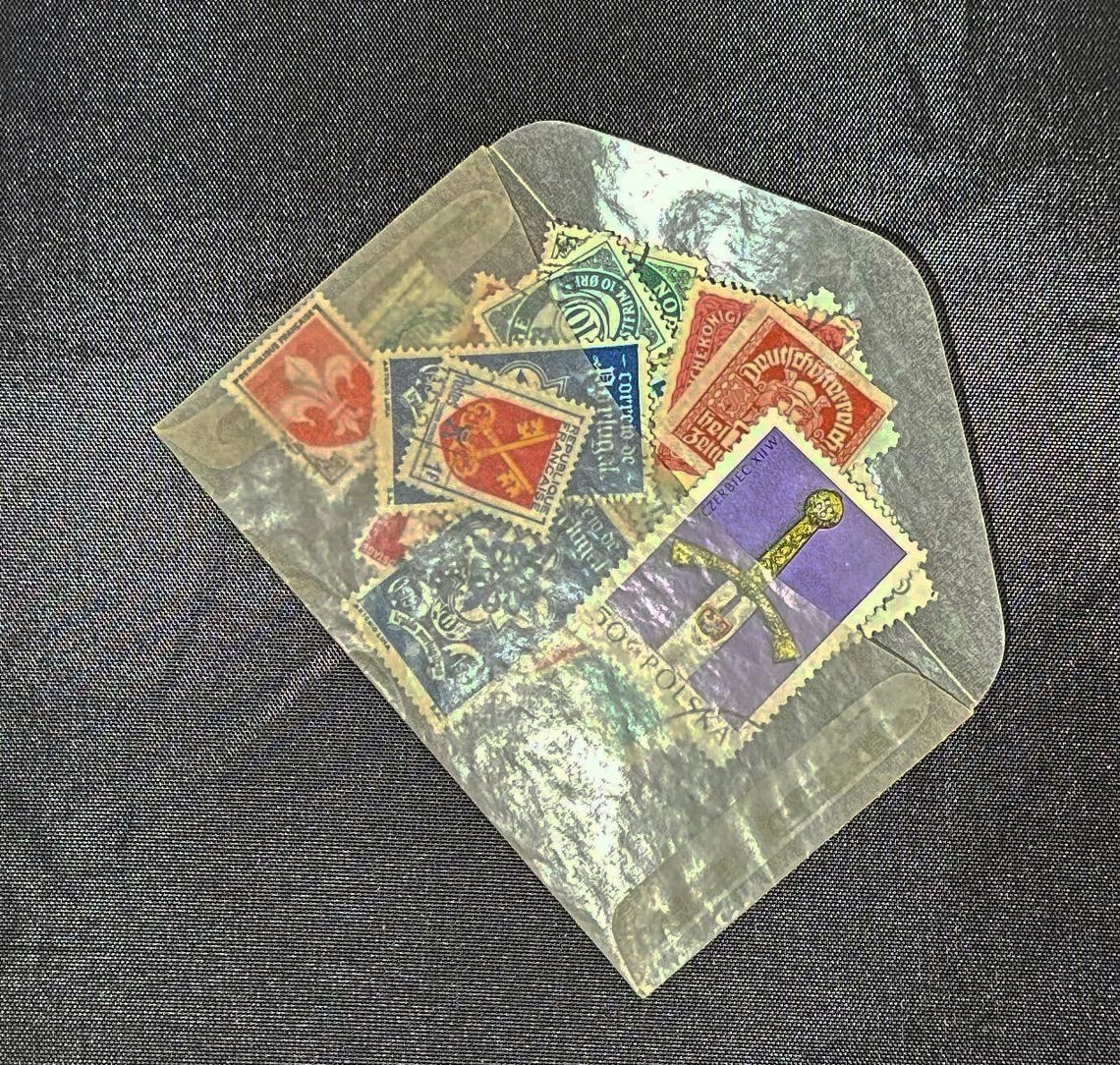 25 Vintage Canceled International Postage Stamps Featuring Crests and ...