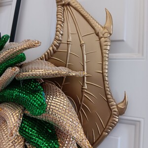 Gold and Green Dragon With Lighted Flame Beautiful Gold and Emerald ...