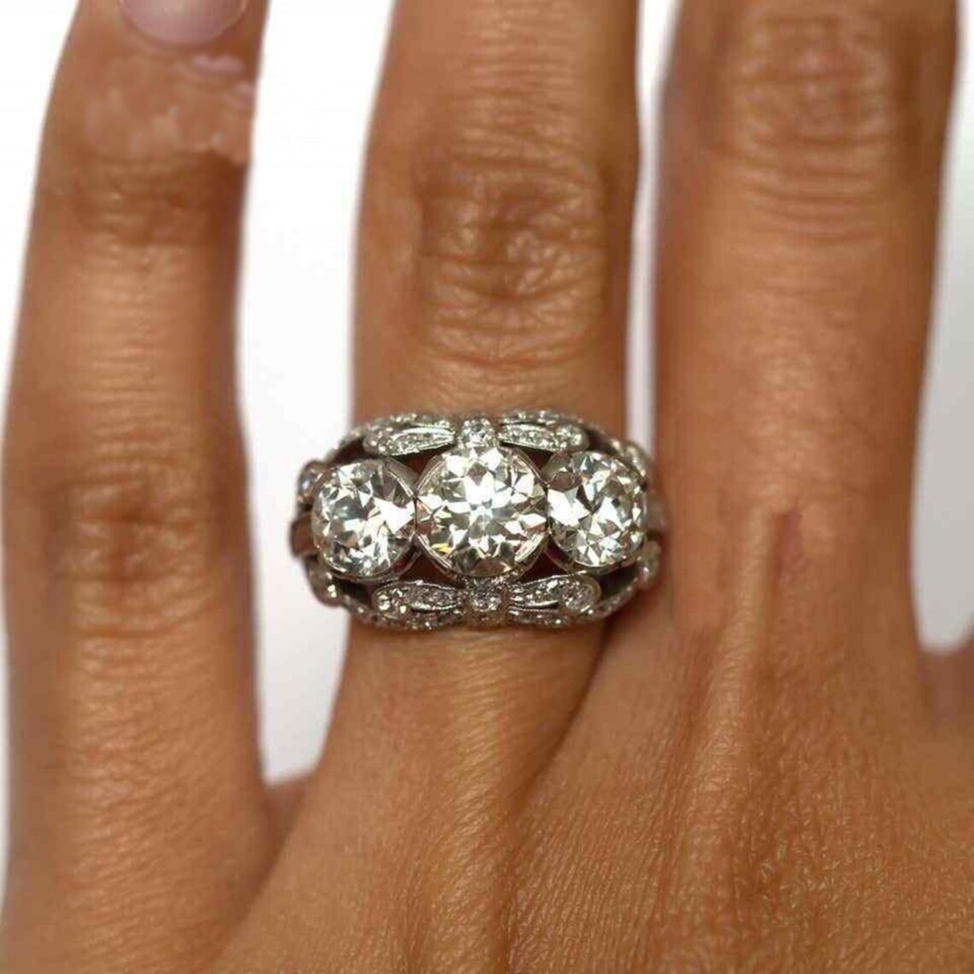 Art deco 3 stone diamond ring store