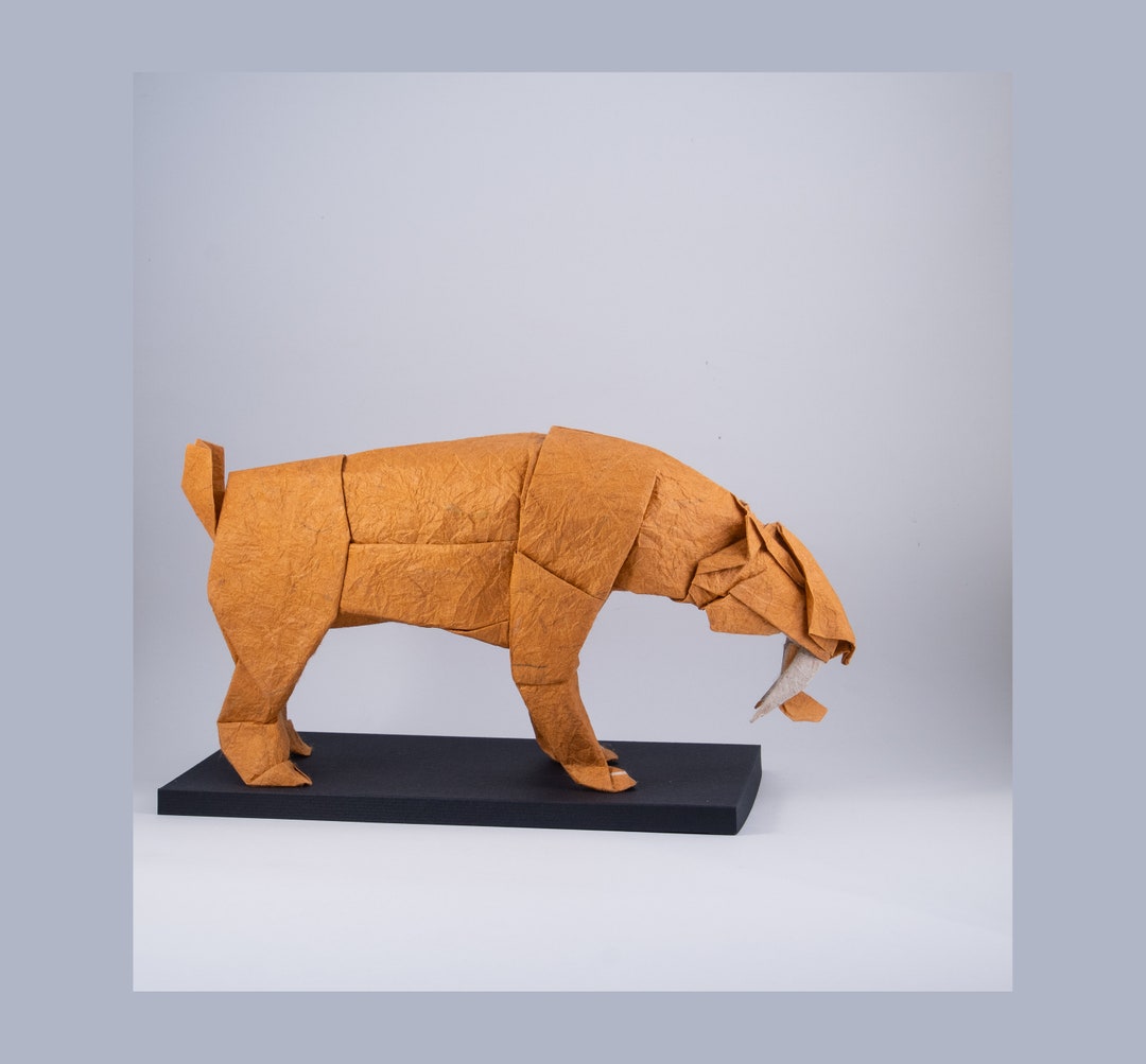 Origami Smilodon. Handmade Origami Prehistoric Saber-toothed Tiger With ...