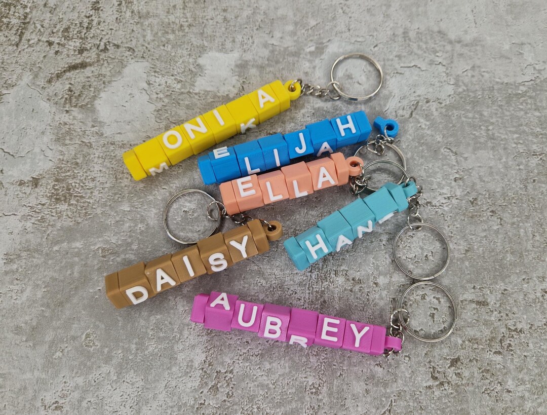 Spinning 3D Key Chain Name Tag, Custom Colored Personalized Keychain ...