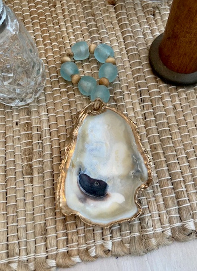 Statement Pieces Natural Oyster Shell Napkin Rings Gold Paint and ...