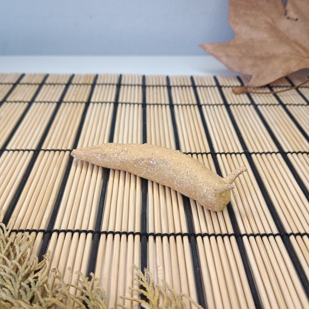 Ceramic Slug With Shiny Gold Glaze - Etsy