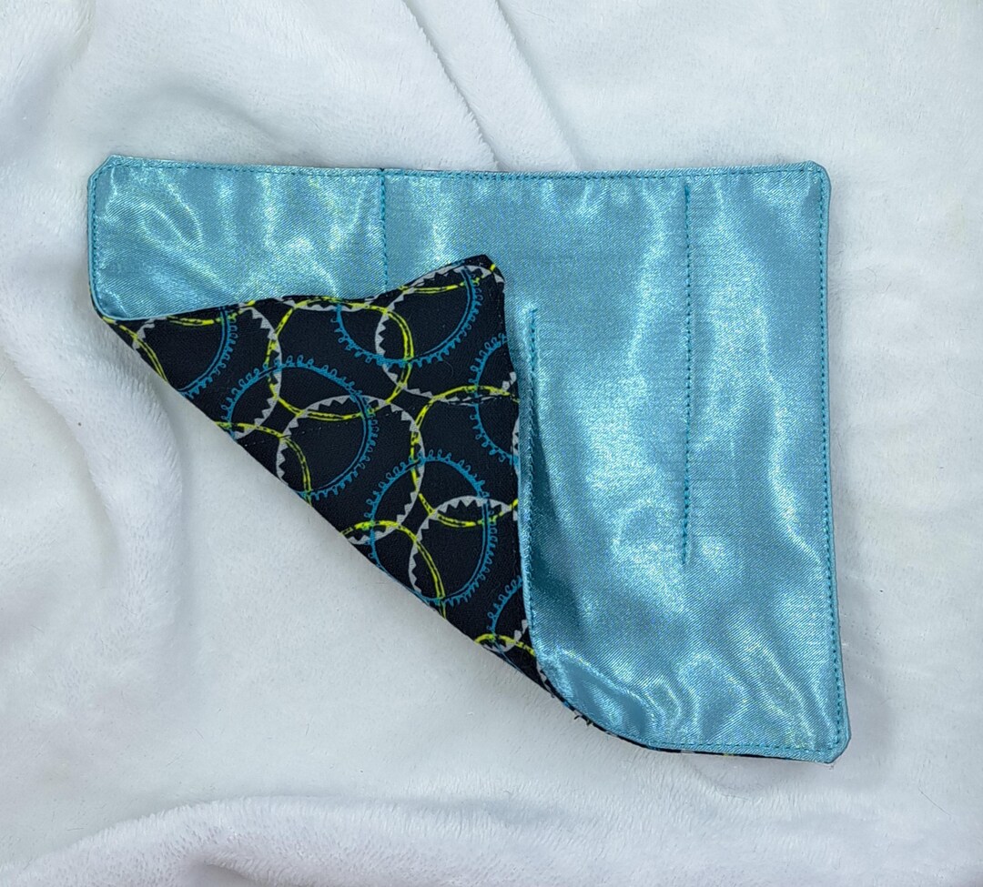 Marble Fidget Toy. Blue, White, and Yellow Overlapping Gears or Circles ...
